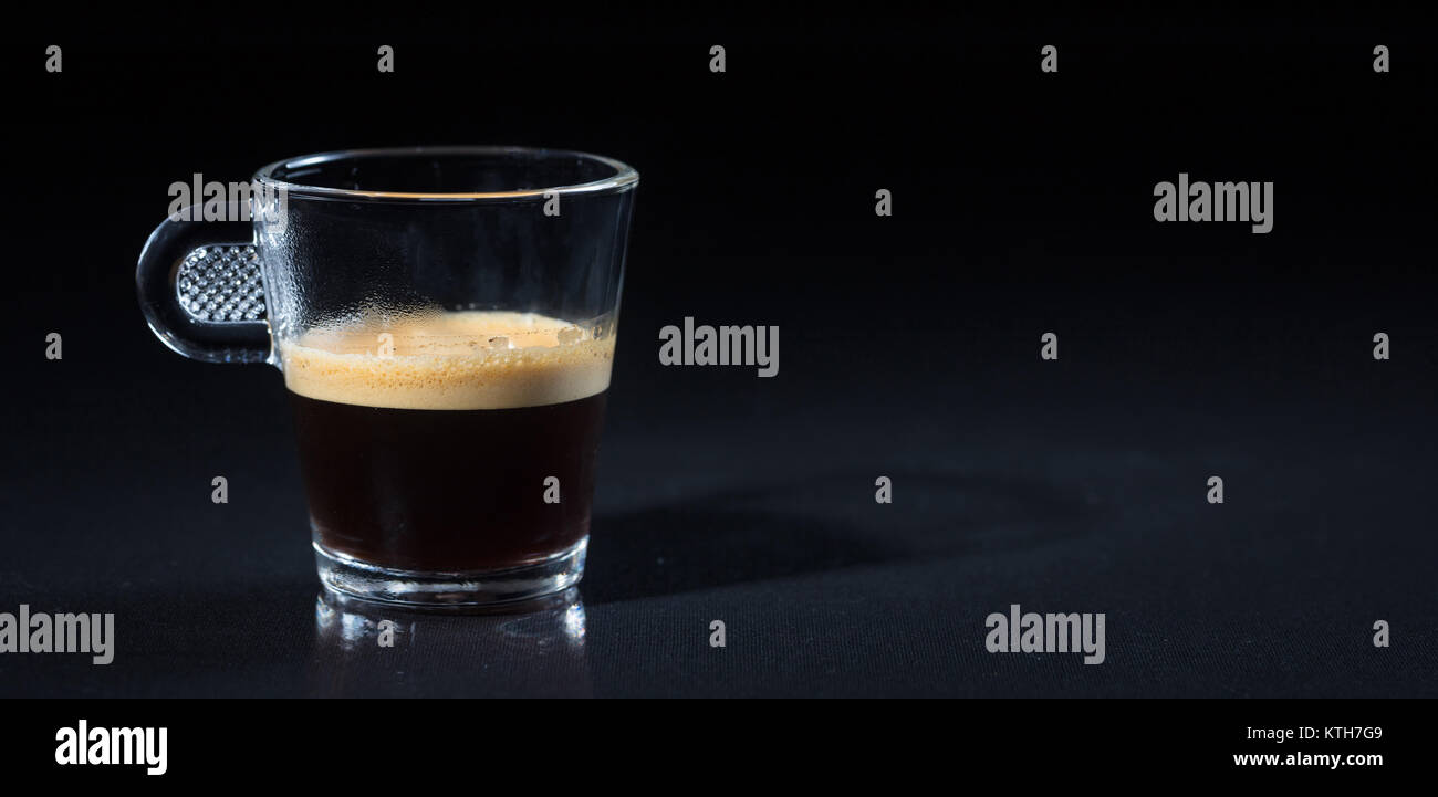 Espresso coffee cup front view on black background, Closeup view with ...