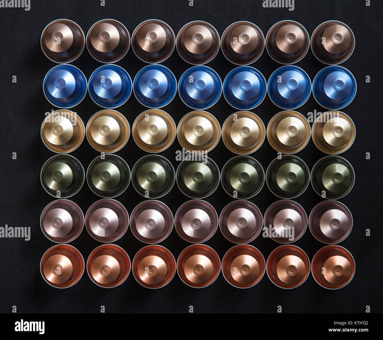 Collection of espresso coffee capsules isolated on black background ...