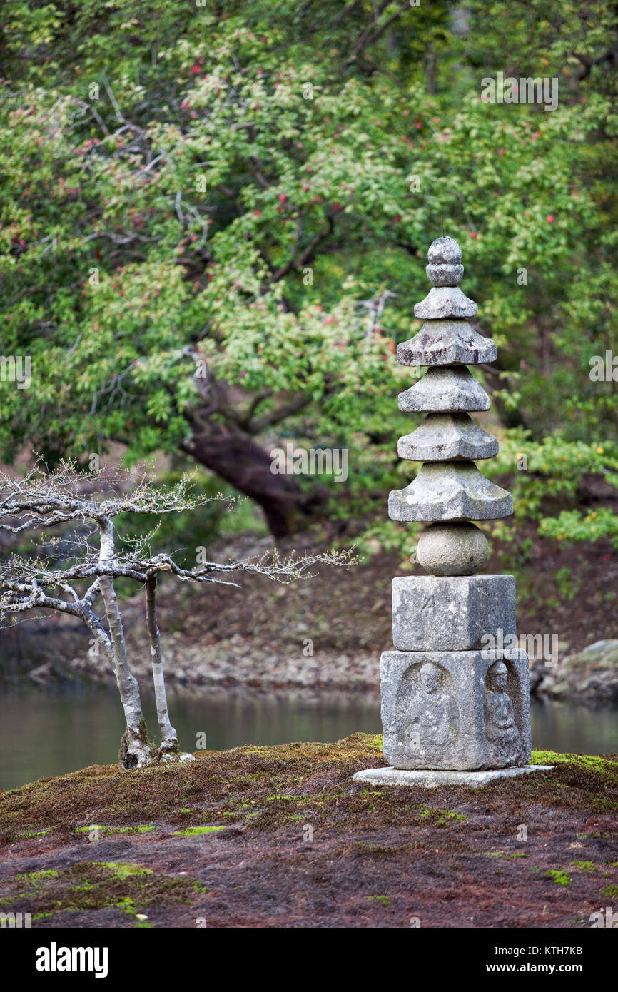 White Snake Pagoda of Kinkaku-ji shrine. Stone construction is on the ...