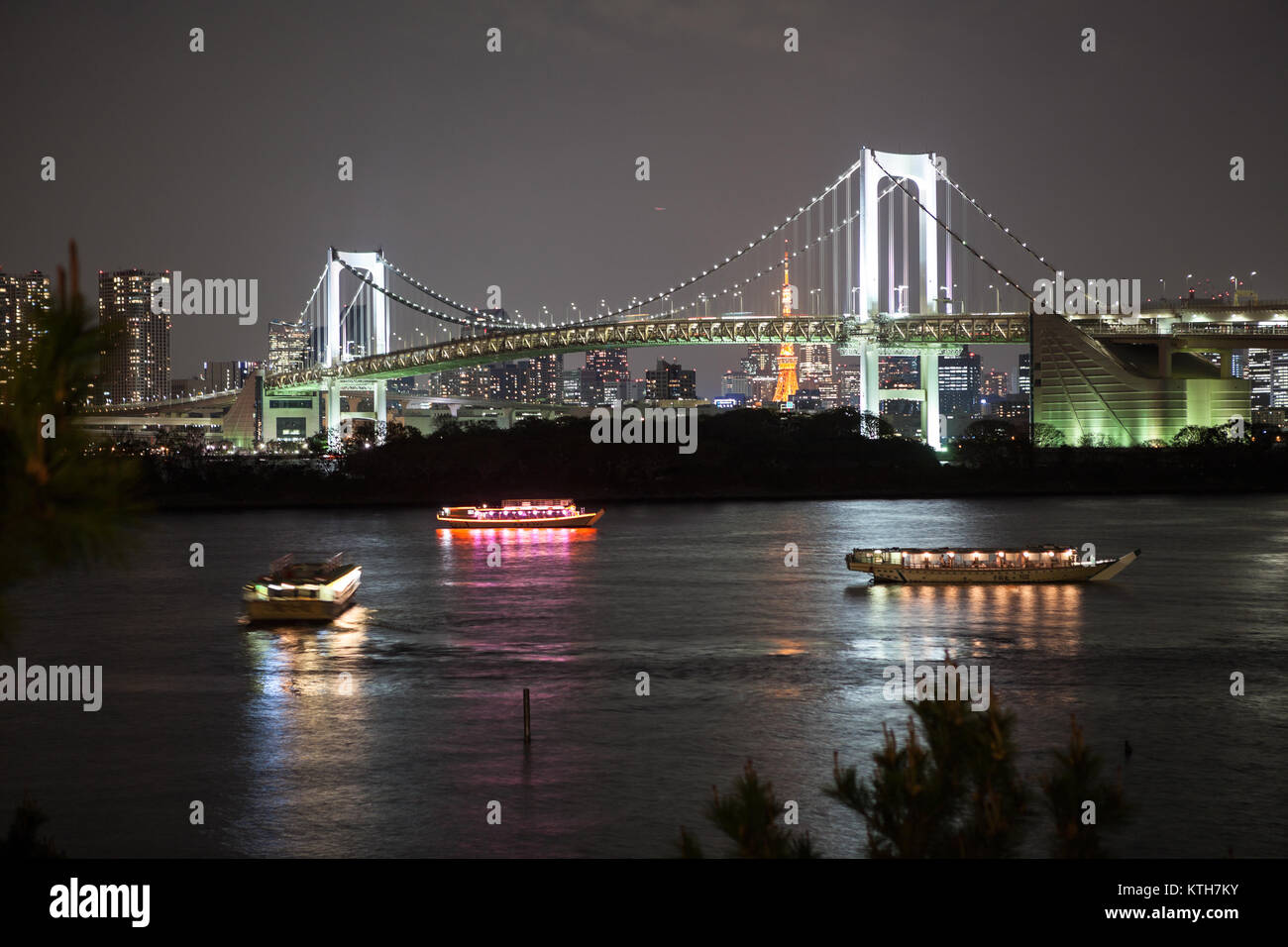 JAPAN, TOKYO-CIRCA APR, 2013: The Rainbow Bridge is across Tokyo Bay ...