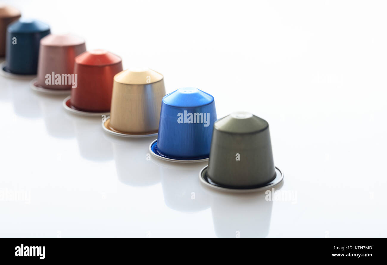 Collection of espresso coffee capsules on white background, Closeup ...