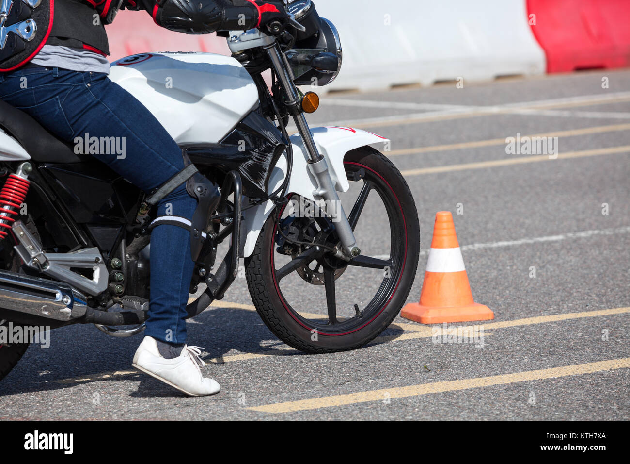 Close-up view at training motorbike with person practicing on motor ...
