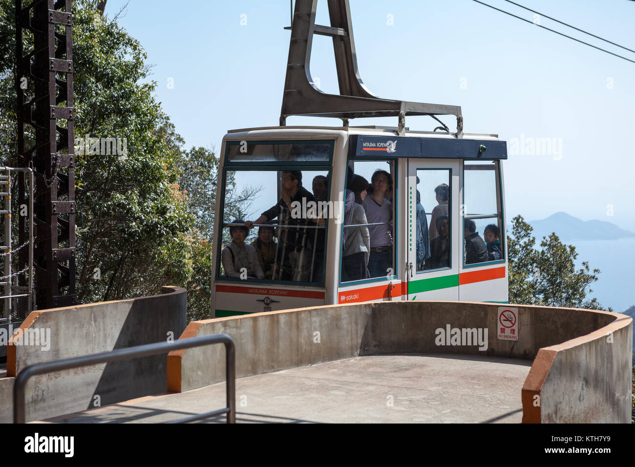ITSUKUSHIMA, JAPAN-CIRCA APR, 2013: Aerial tramway with 30 passenger ...