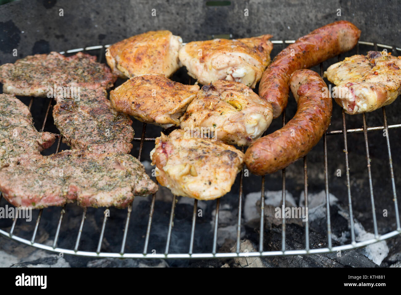 barbecue with delicious grilled meat on grill Stock Photo - Alamy