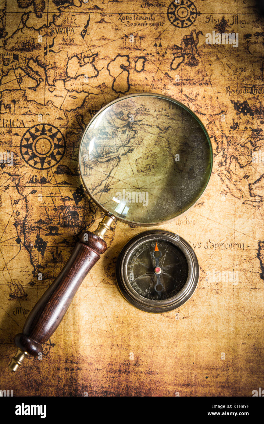 old map with compass and Magnifier Stock Photo - Alamy
