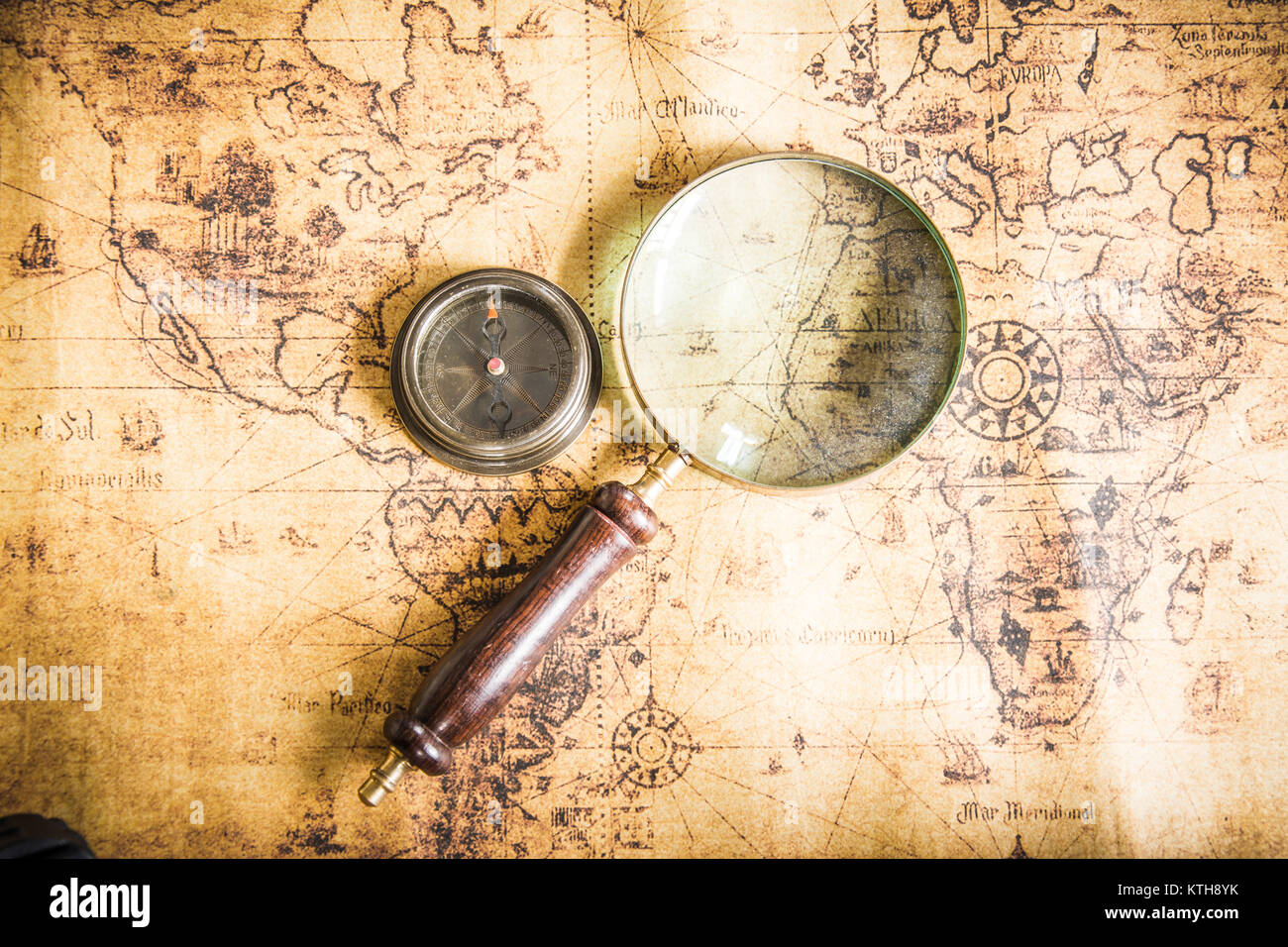 old map with compass and Magnifier Stock Photo - Alamy