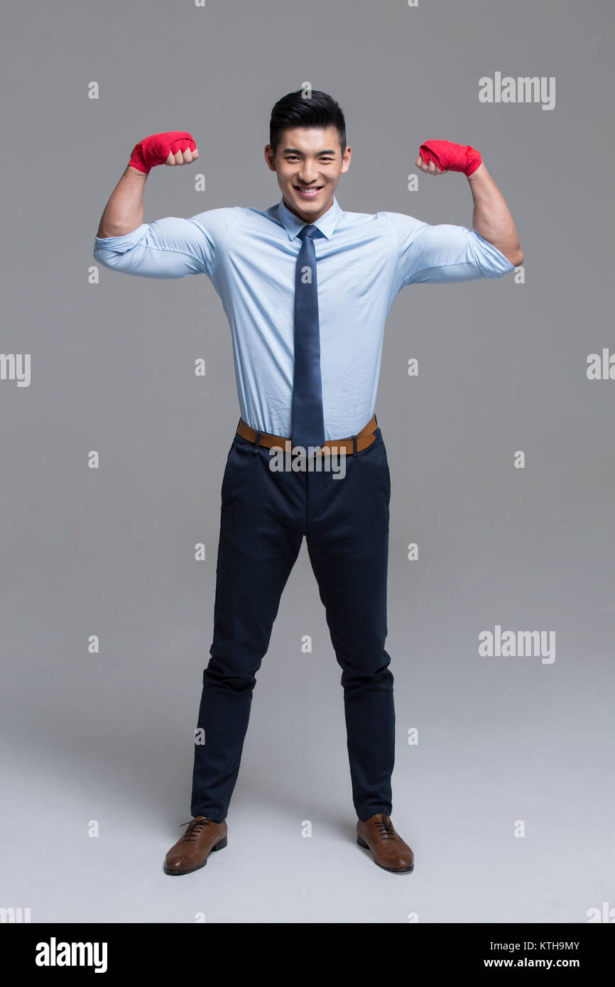 Young businessman boxing Stock Photo - Alamy