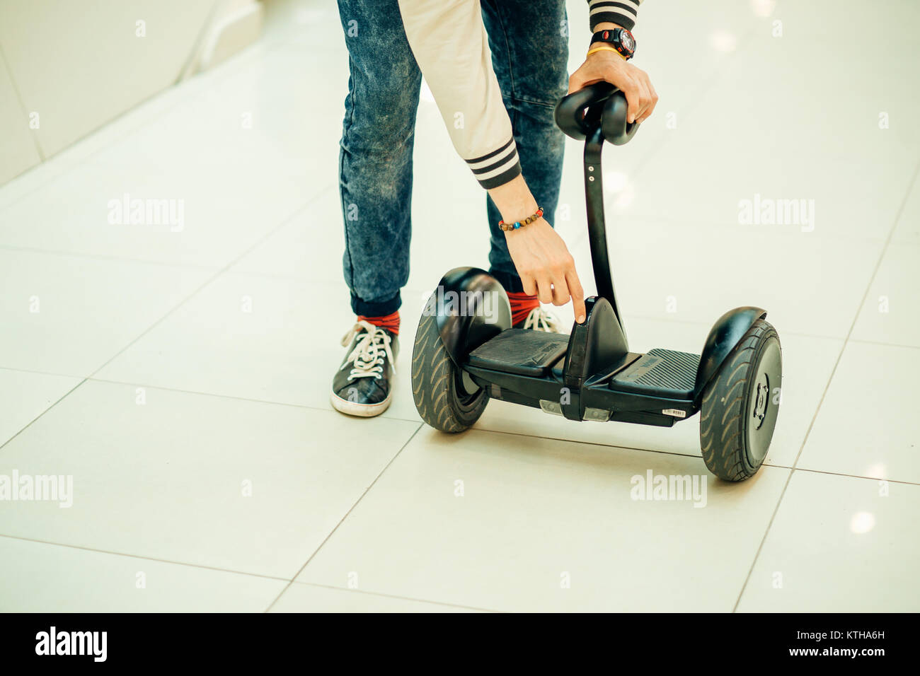 man activate electric segway at mall, active man using modern transport ...