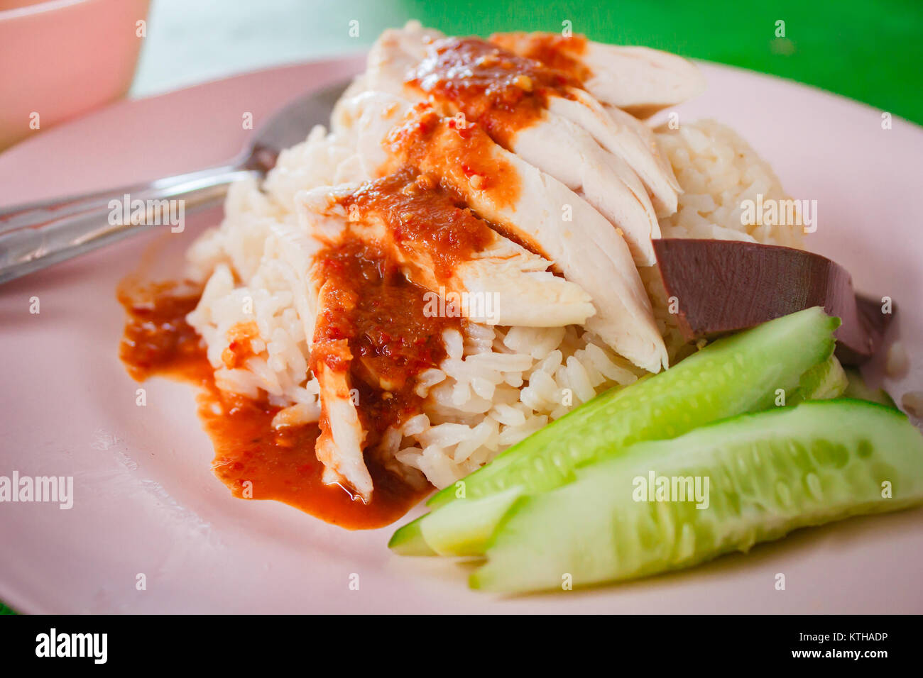 Hainanese chicken rice, steamed chicken with rice and sauce Stock Photo ...