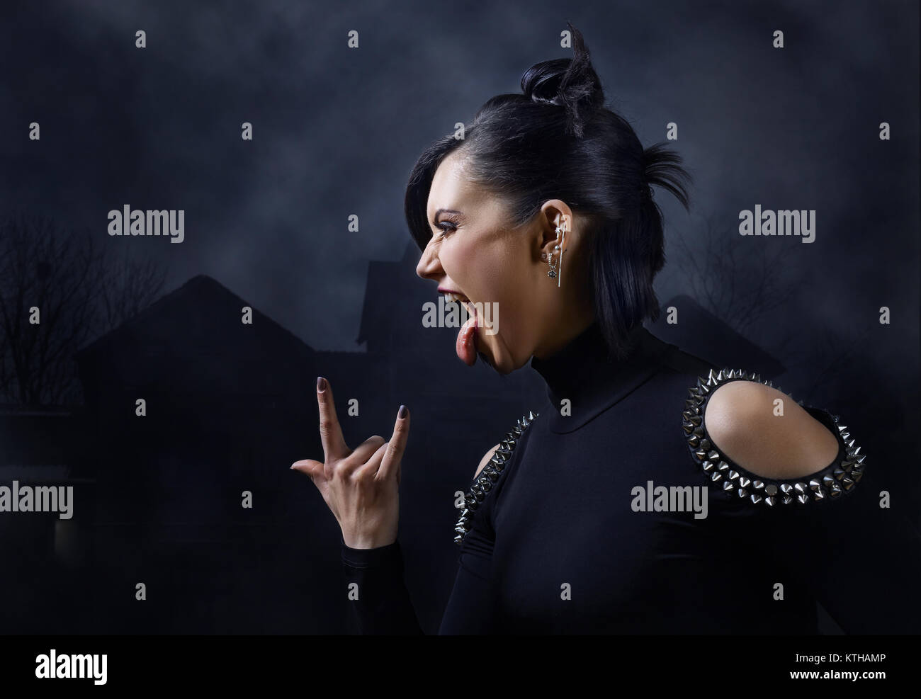 Woman punk on a background of night city Stock Photo - Alamy