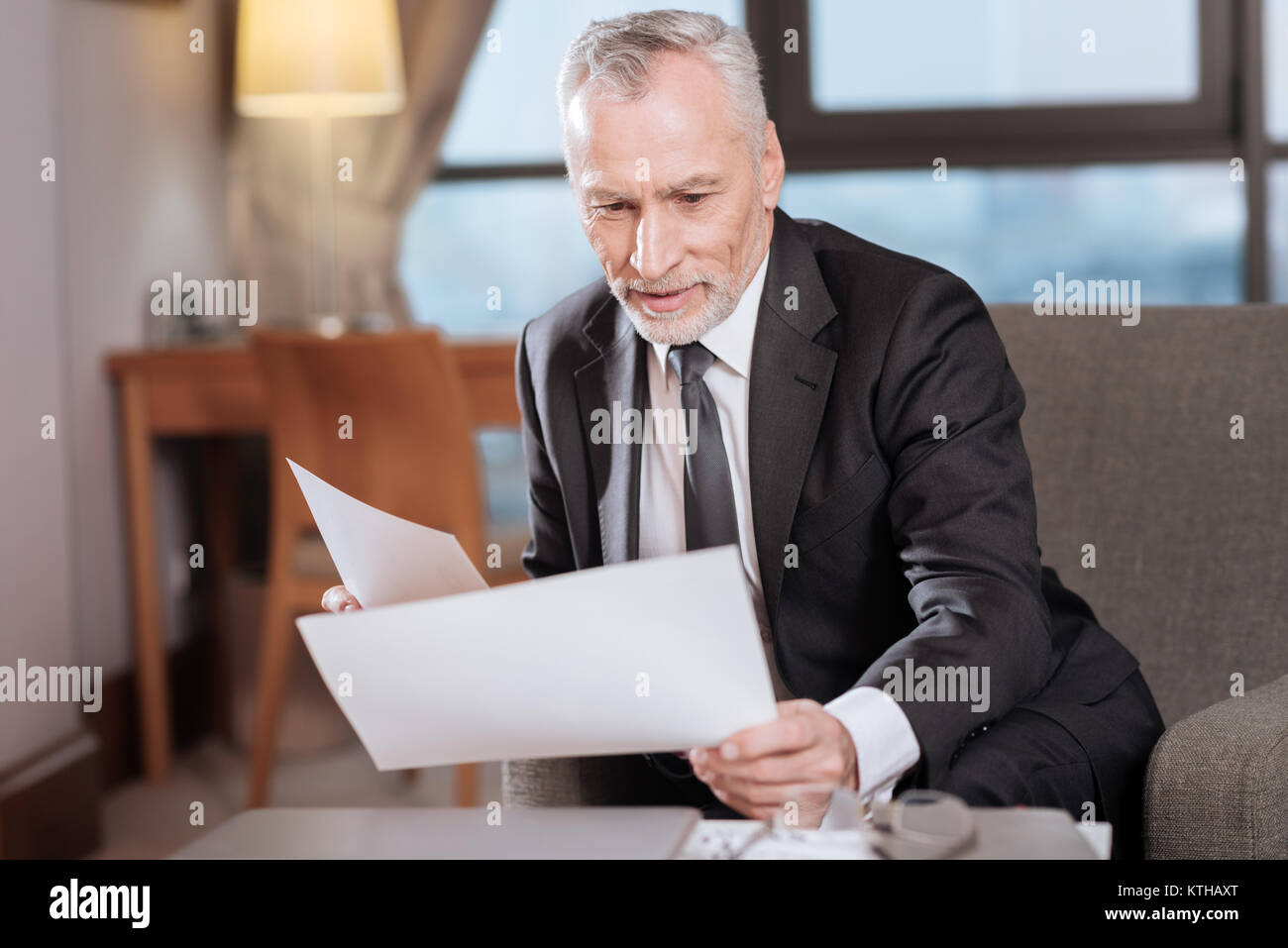 Looking through documents hi-res stock photography and images - Alamy