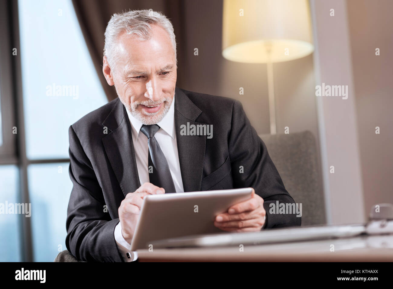 Senior happy man using hi-res stock photography and images - Alamy