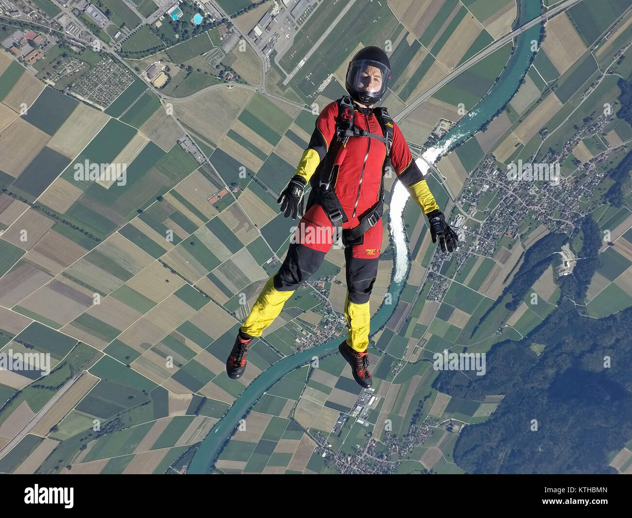 Look at this skydiving girl which is tracking on her back over a ...