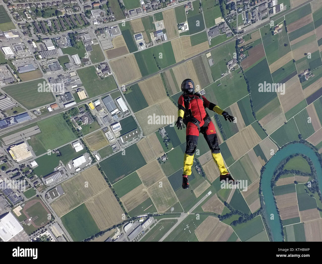 Look at this skydiving girl which is tracking on her back over a ...