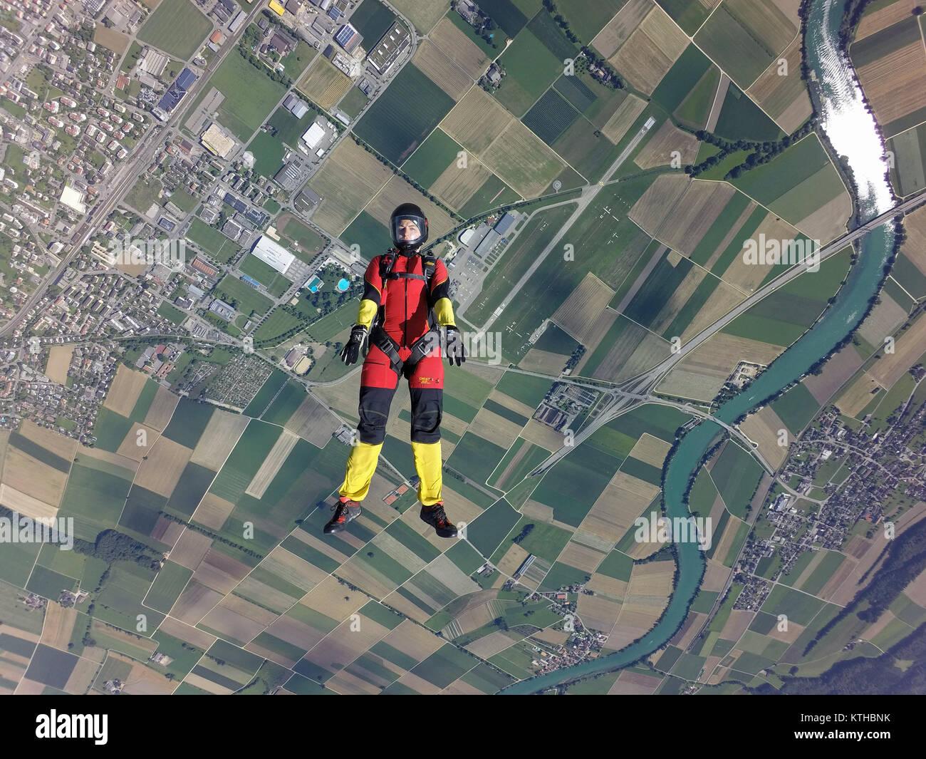 Look at this skydiving girl which is tracking on her back over a ...
