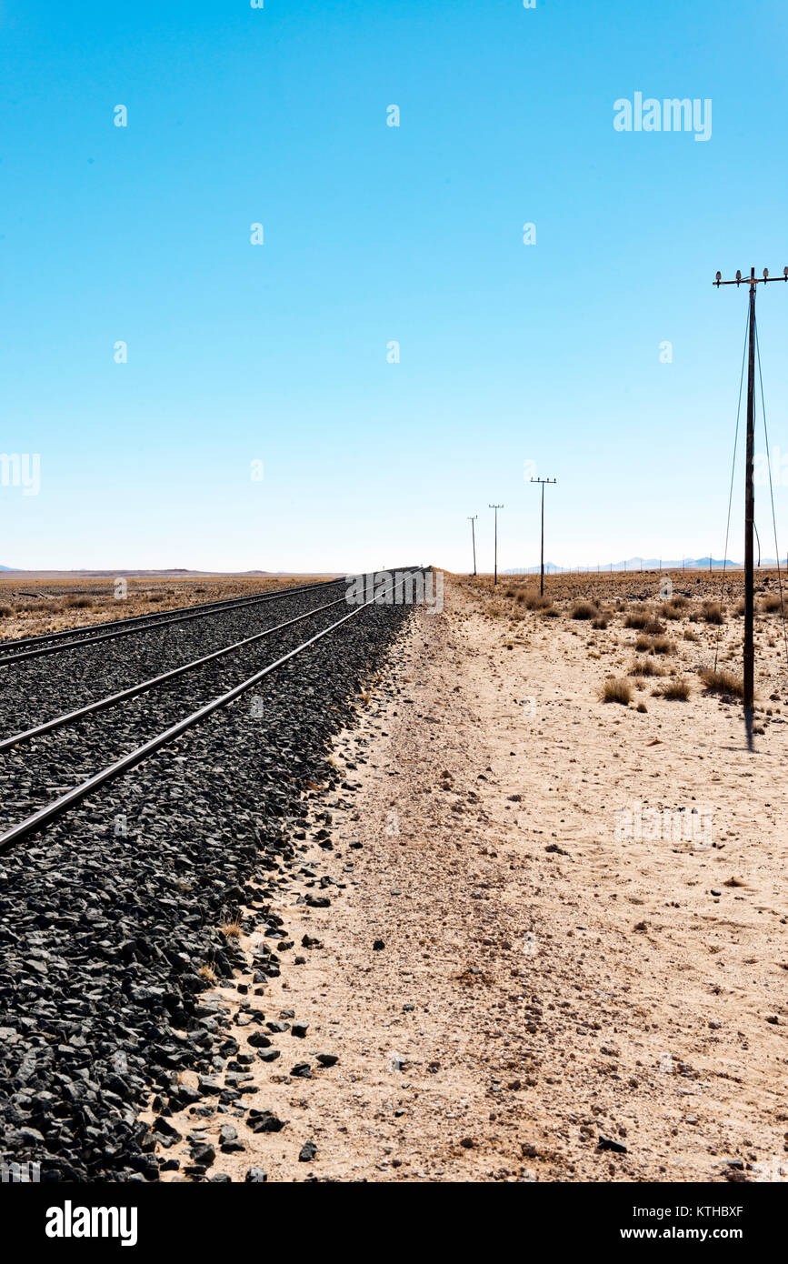 Desert rail tracks in Namibia, crossing the Naukluft desert near Garub ...
