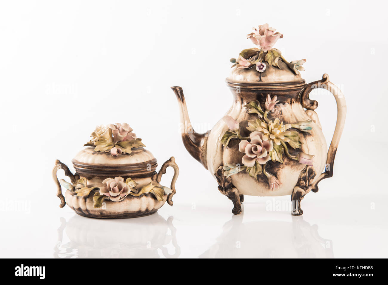Victoria handmade cermaic tea pot set over a white backgroundsugar ...