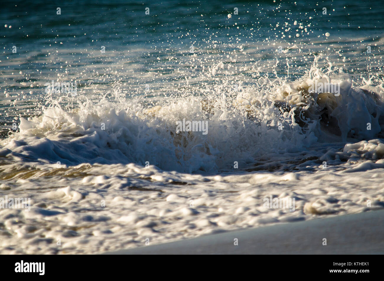 Waves crashing on beach cold hi-res stock photography and images - Alamy