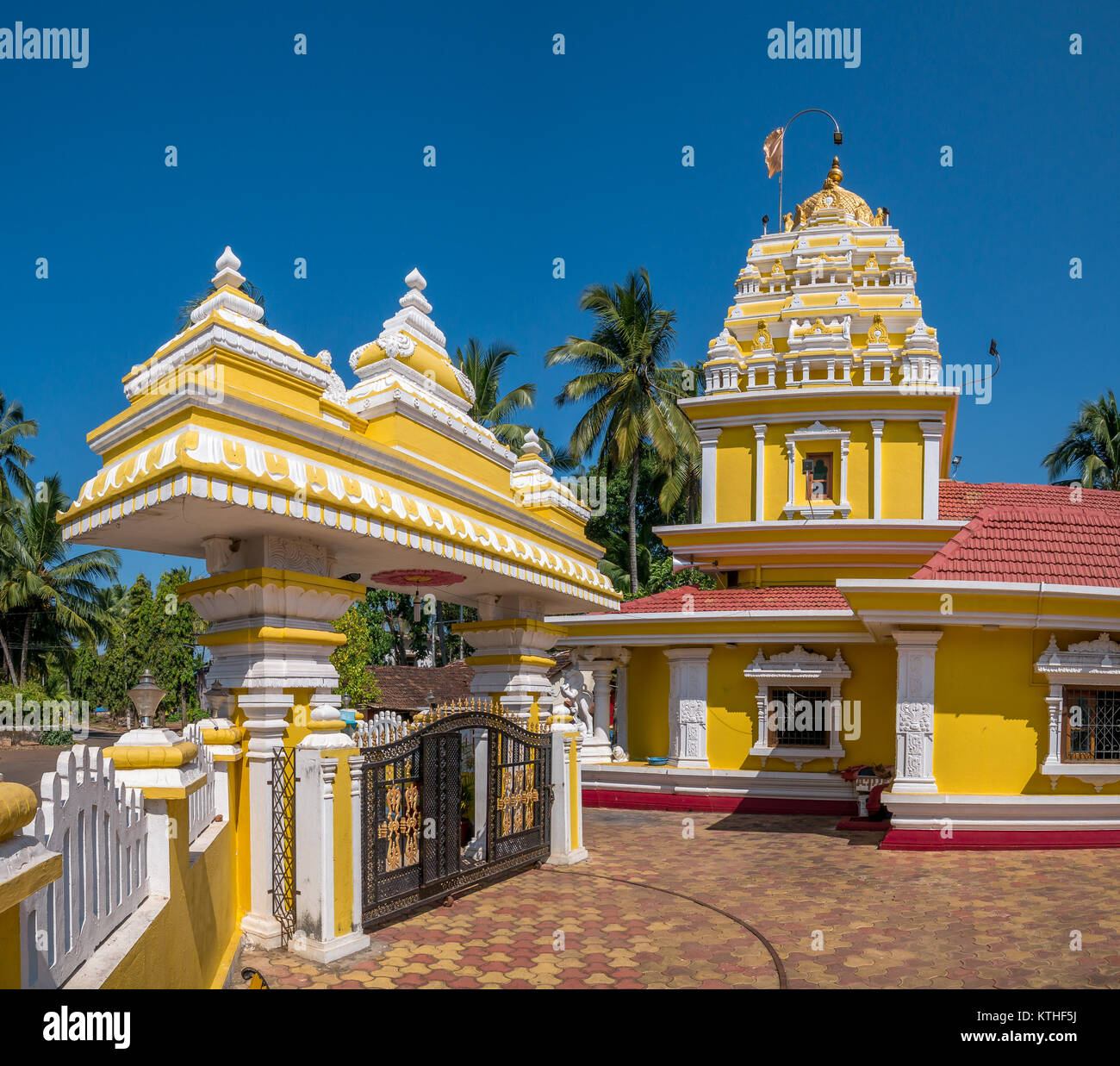 Goa, India - December 20, 2017 : A Hindu temple beautifully colored in ...