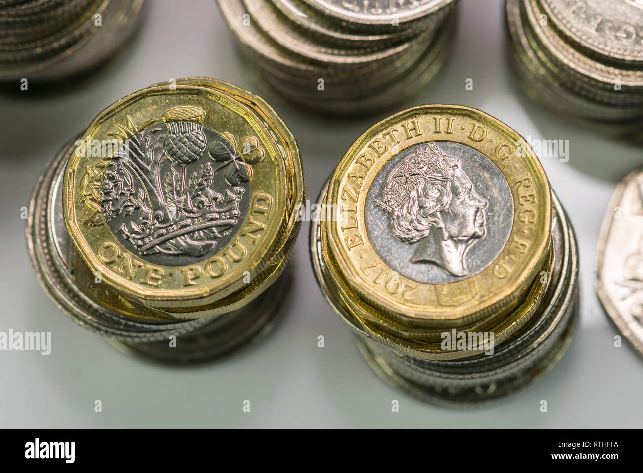 Close up focus photos of new United kingdom Pound coin, among other ...