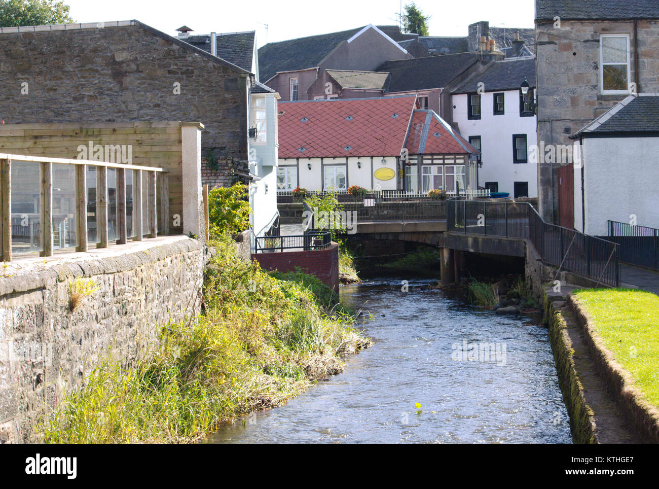 Urban watercourse, stream through a town Stock Photo - Alamy