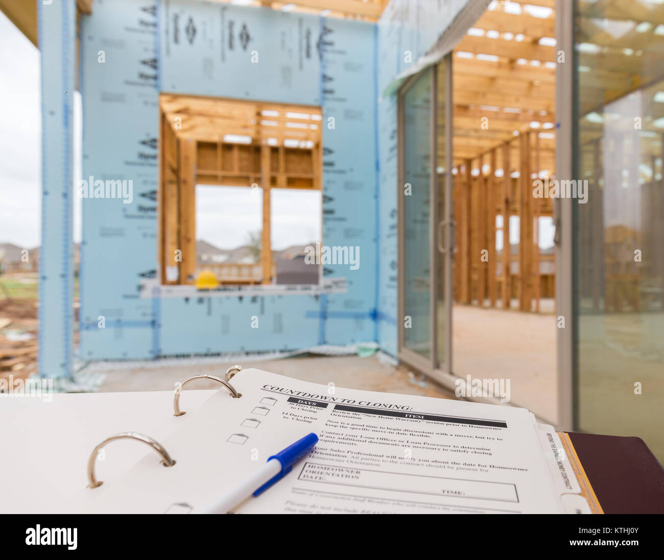 A new single family house under construction and new home closing ...