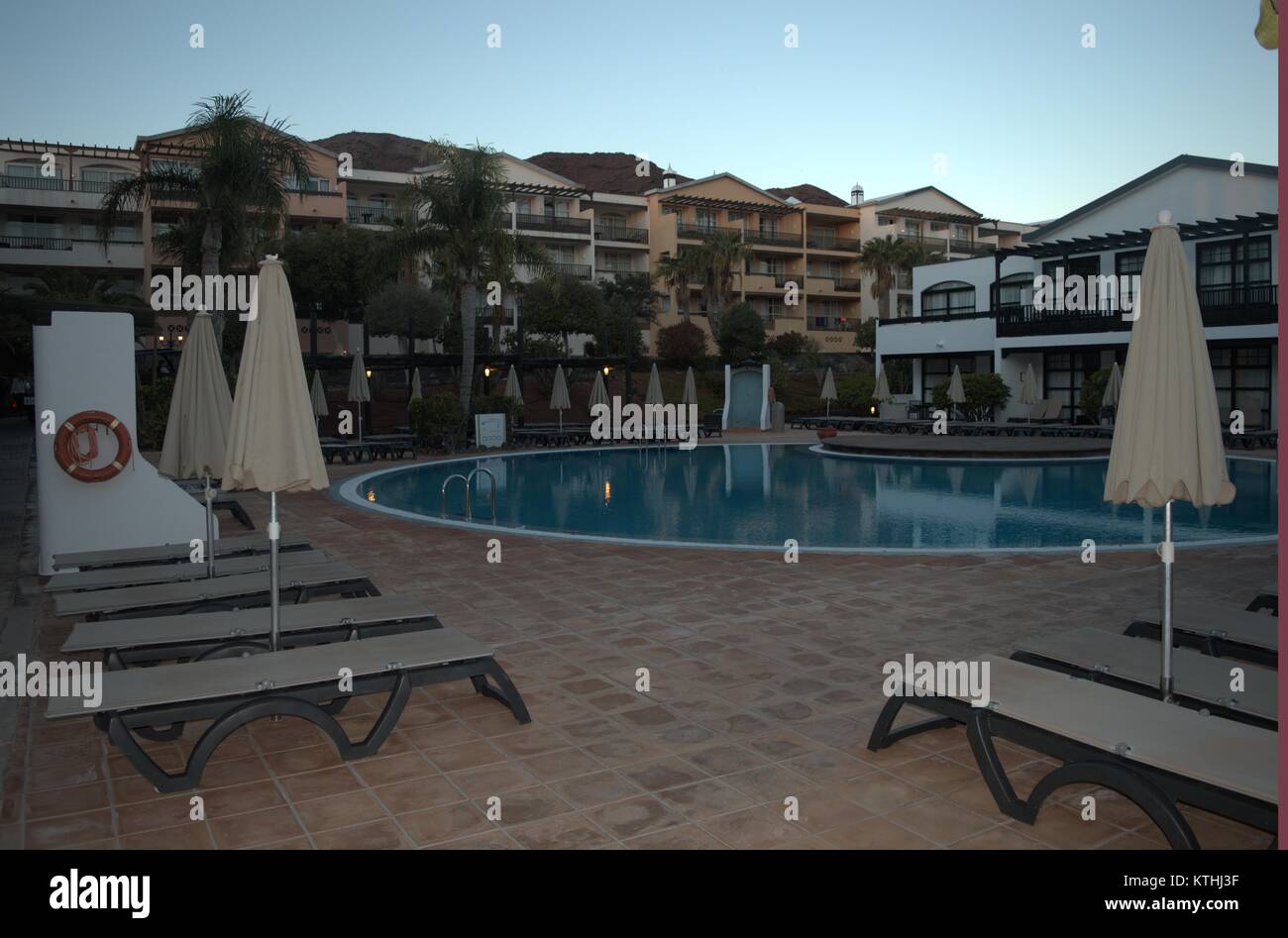 swimming pool and sunbath Stock Photo - Alamy