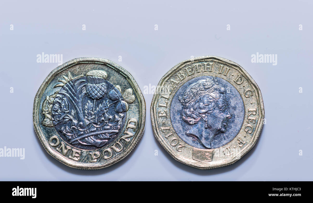 Close up focus photos of new United kingdom Pound coin isolated on a ...