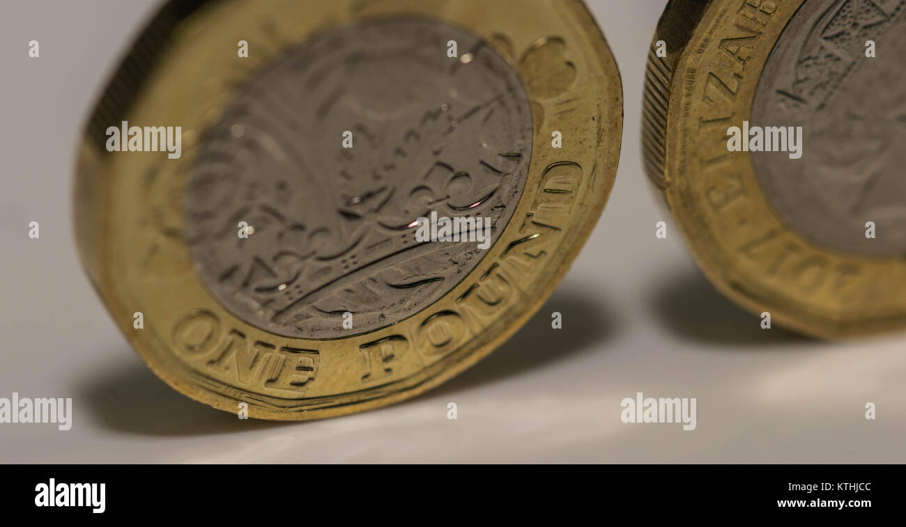 Close up focus photos of new United kingdom Pound coin isolated on a ...