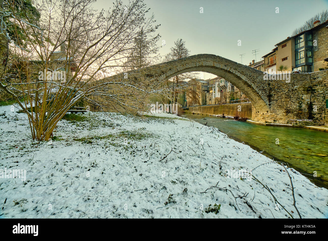 Ancient medieval donkey-back bridge with a unique arch in a village in ...