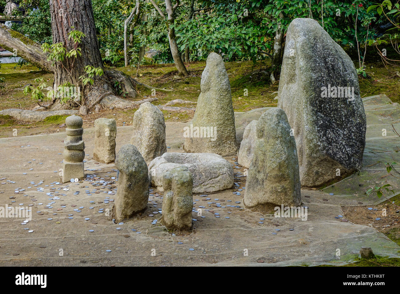 Offerings to Stone Idols at Kinkakuji Temple in Kyoto, Japan Stock ...