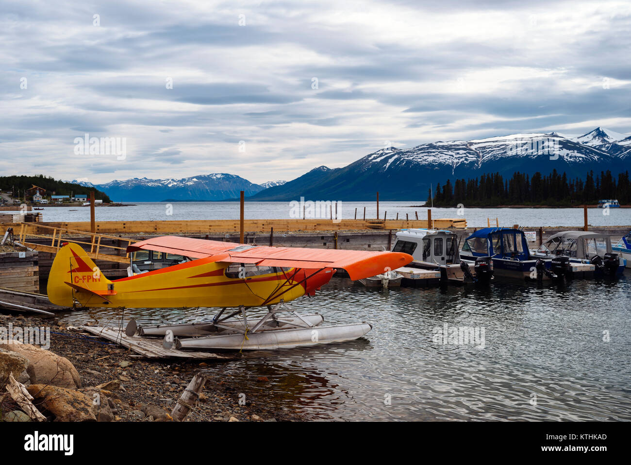 A float plane on Atlin Lake in the village of Atlin, a remote village ...