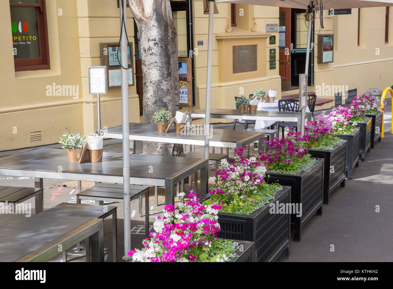 Tables and chairs outside a restaurant hi-res stock photography and ...