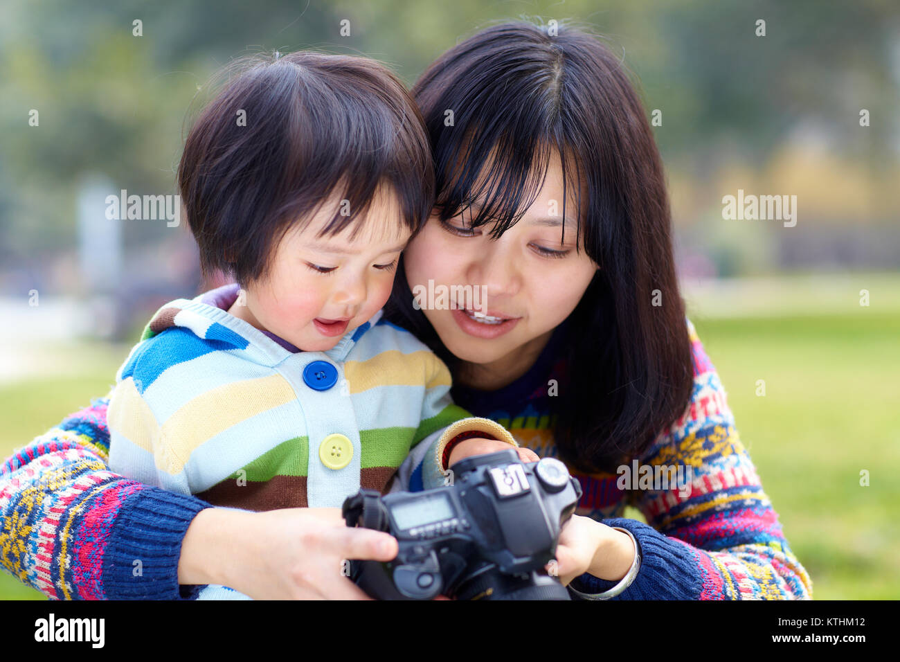 happy family using camera Stock Photo - Alamy