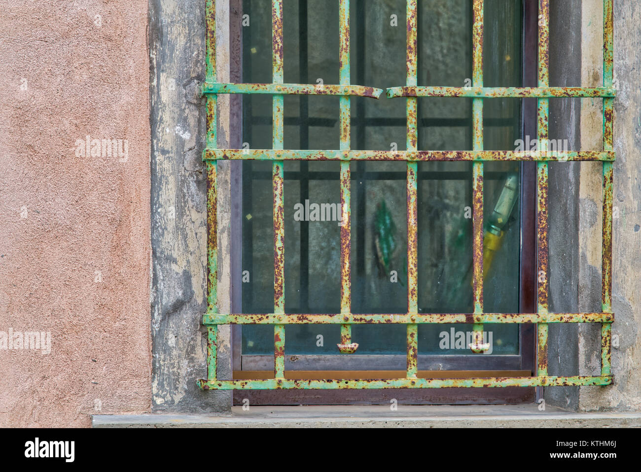 Peeling and rusty grate of old iron window Stock Photo - Alamy