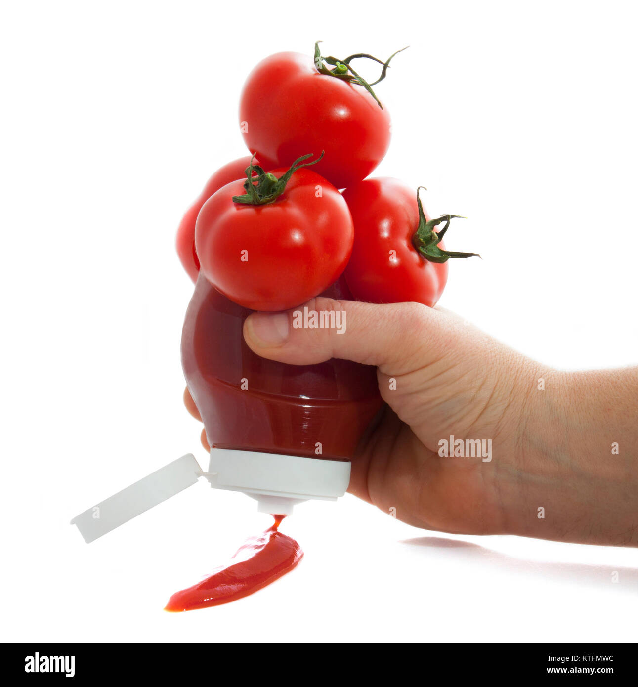 Holding juice bottle Cut Out Stock Images & Pictures - Alamy