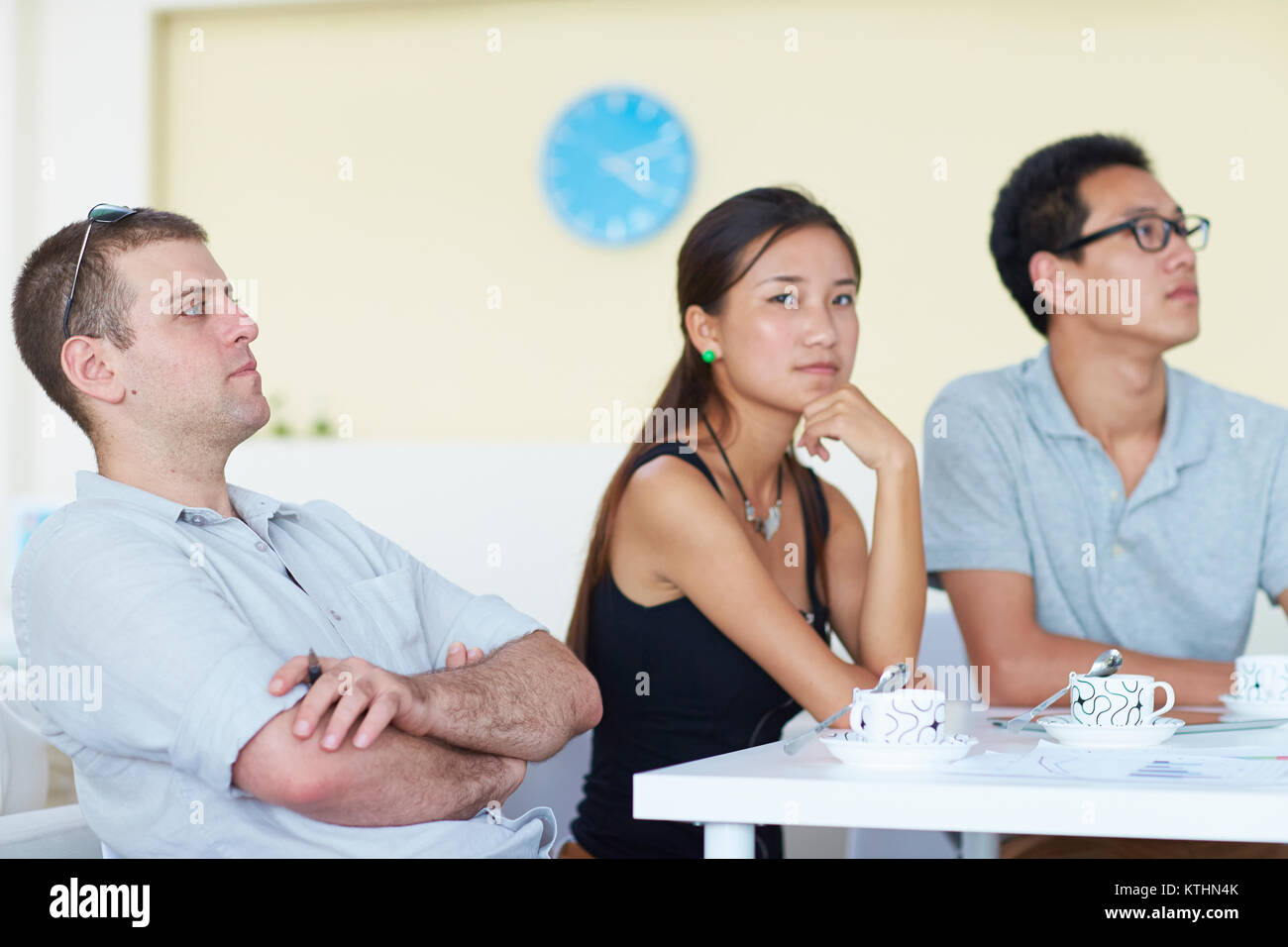 three business people focus in meeting Stock Photo - Alamy
