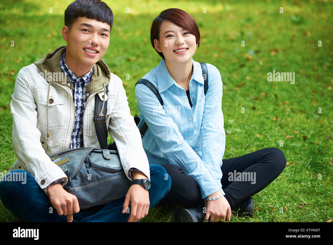 Asian people sitting together hi-res stock photography and images - Alamy