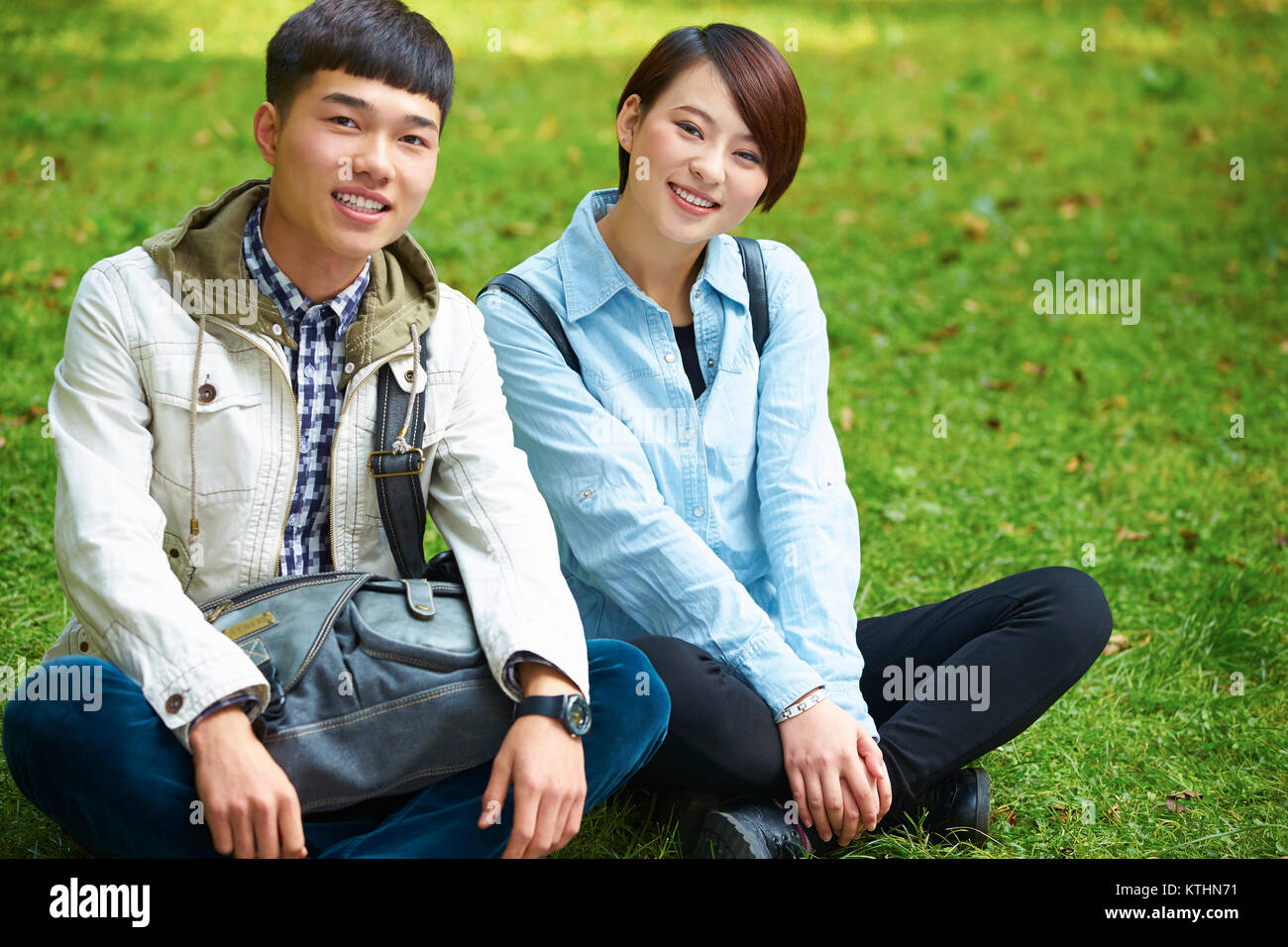 Asian people sitting together hi-res stock photography and images - Alamy