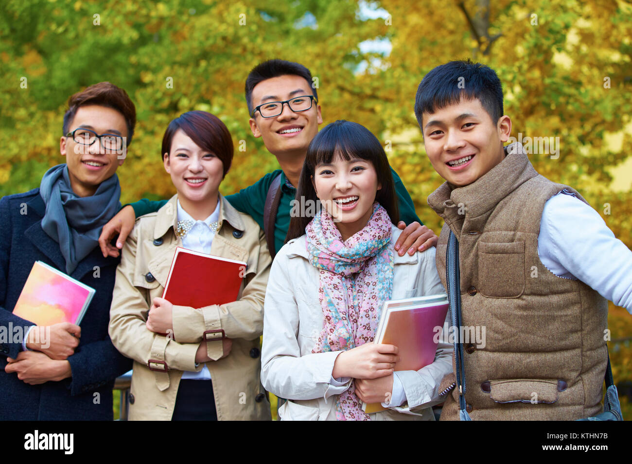group of happy asian college students looking at camera smile in the ...