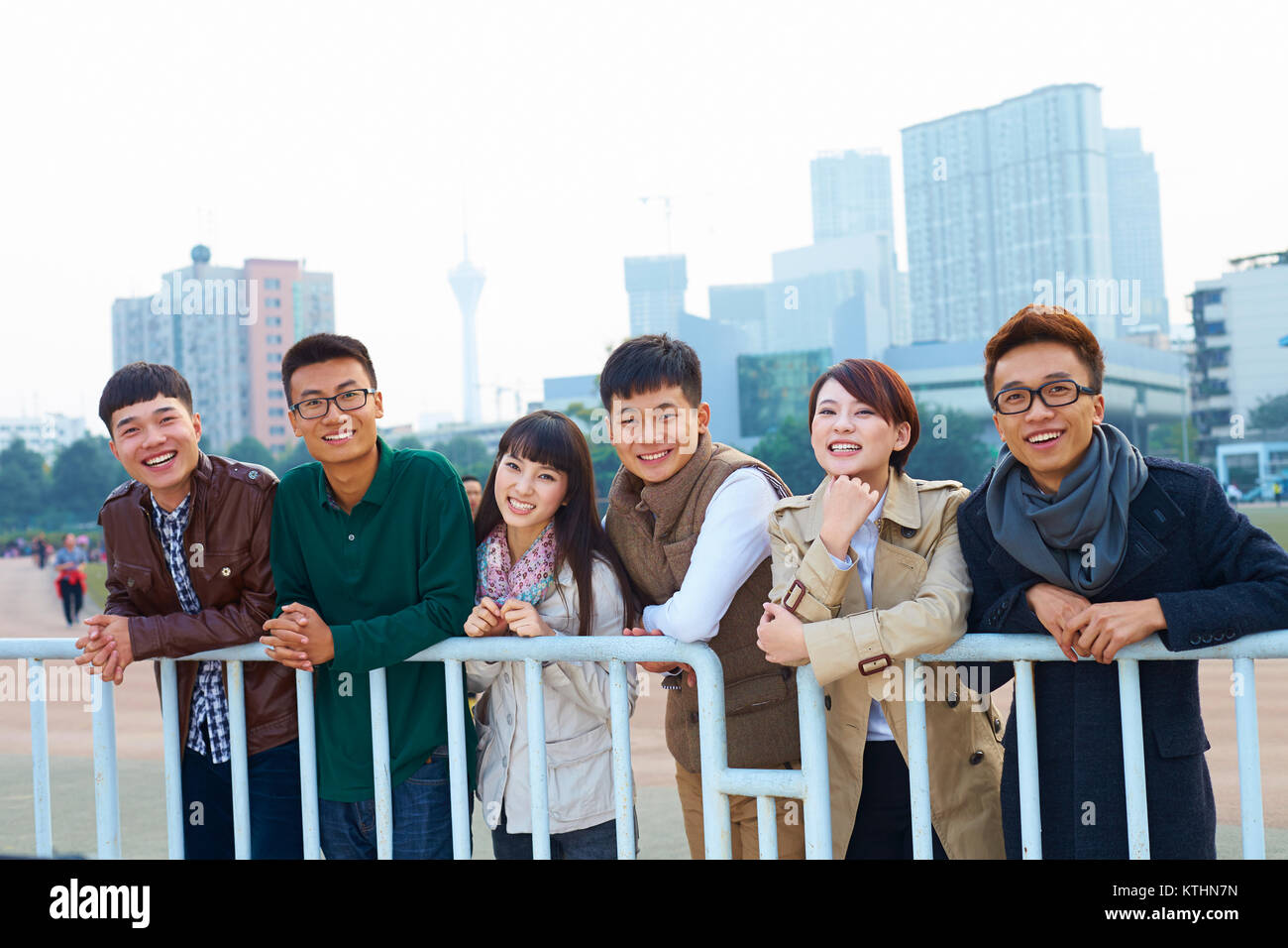 group of happy asian college students looking at camera smile in the ...