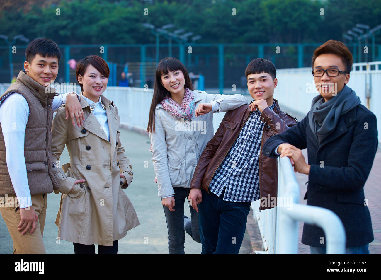 group of happy asian college students looking at camera smile in the ...