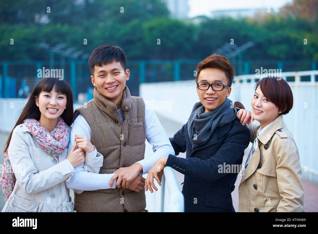 group of happy asian college students looking at camera smile in the ...