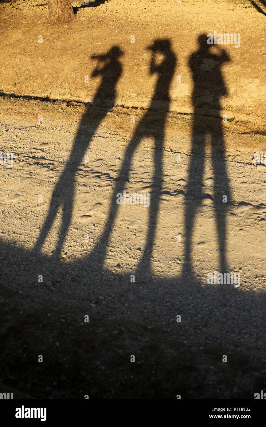 Threesome of photographer Stock Photo - Alamy