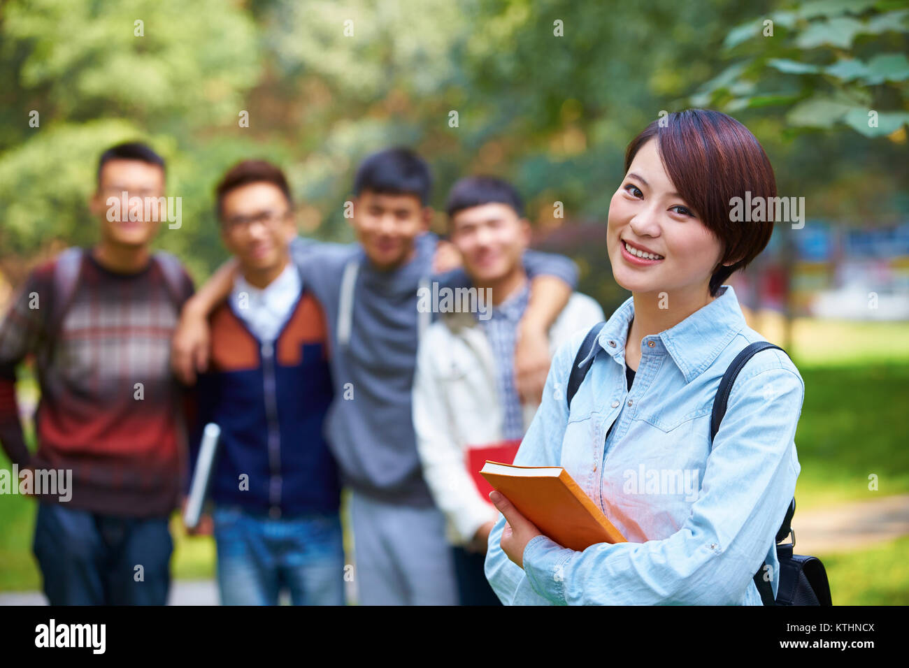 happy young asian college students smile at camera Stock Photo - Alamy