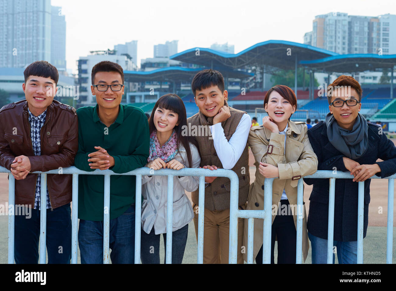 group of happy asian college students looking at camera smile in the ...
