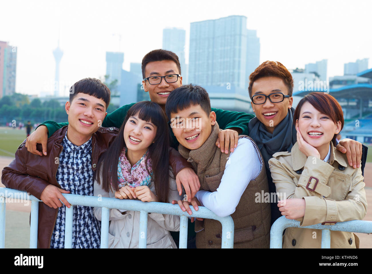 group of happy asian college students looking at camera smile in the ...