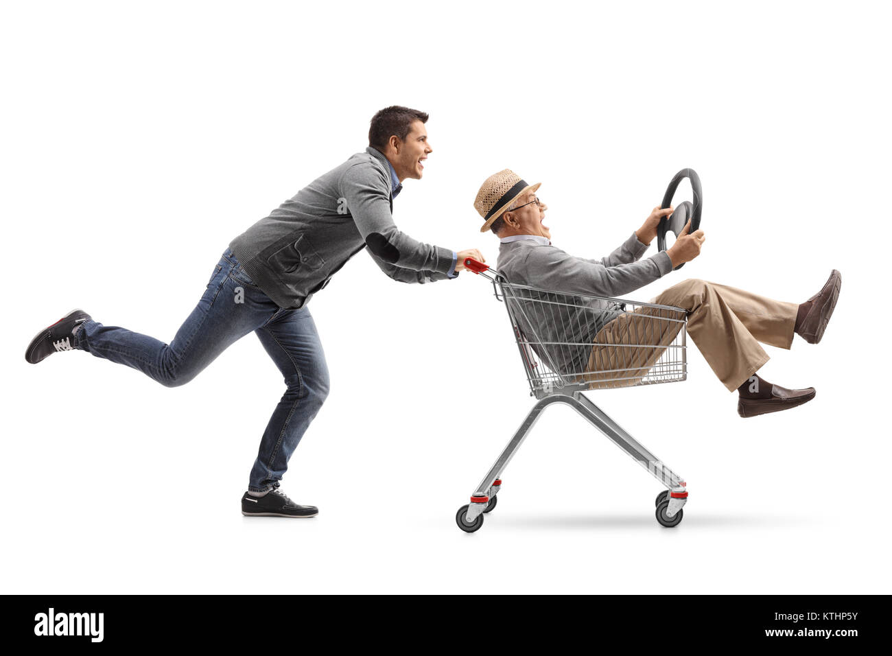 Senior man pushing young Cut Out Stock Images & Pictures - Alamy