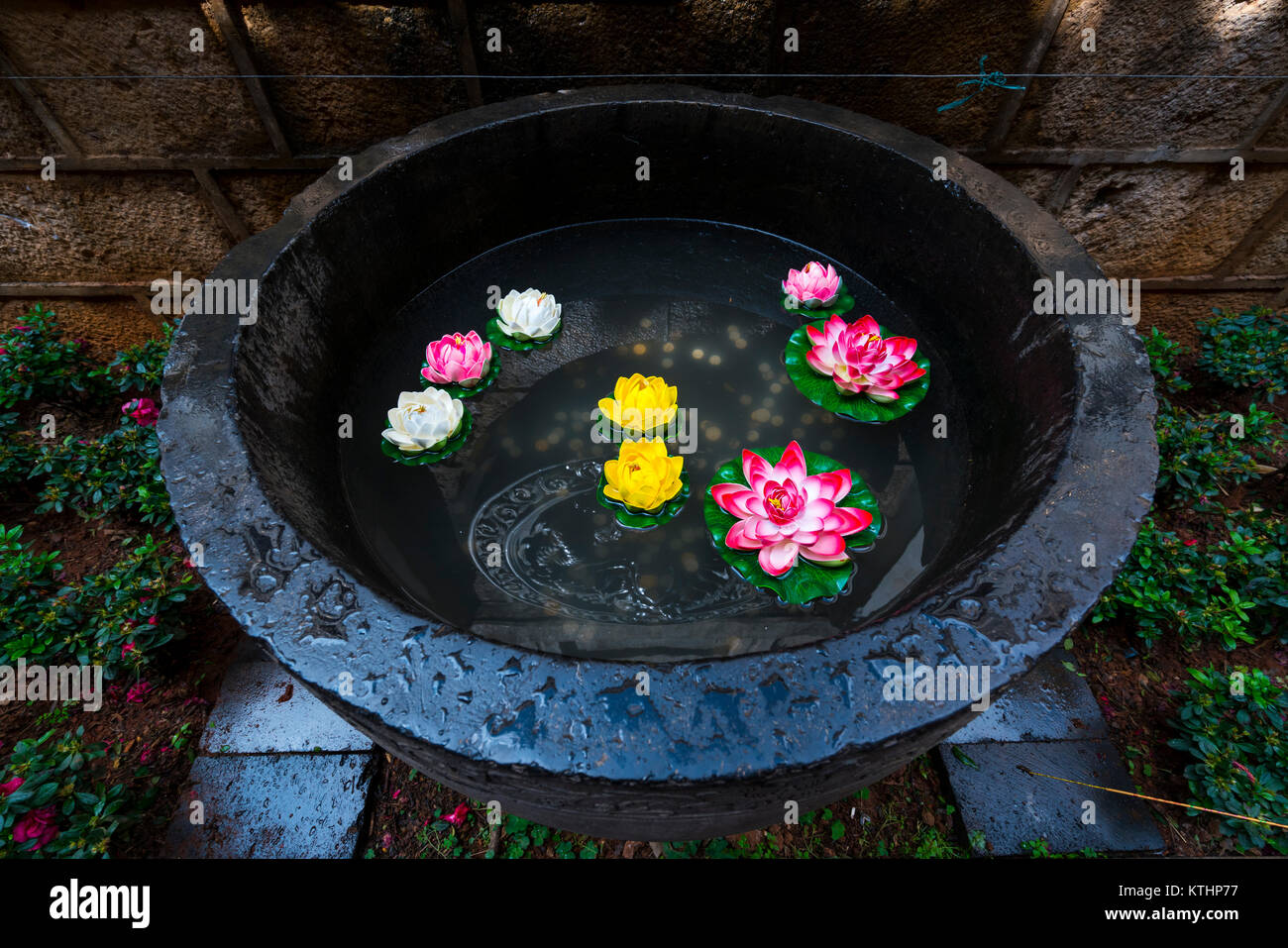 Offering of flowers in a font, Yuantong Buddhist Temple, Kunming ...