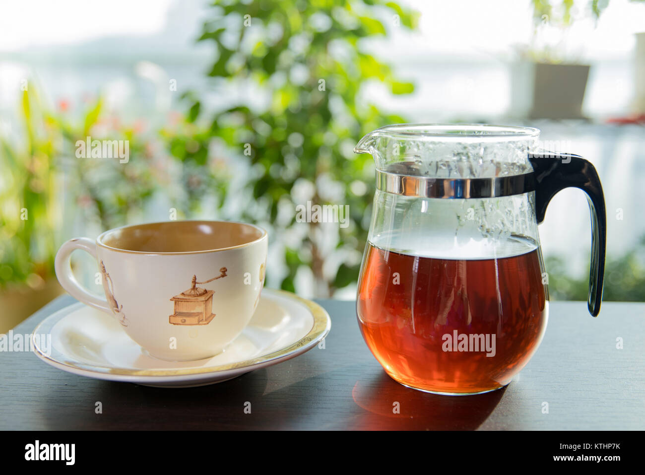 Cup of tea with teapot Stock Photo - Alamy
